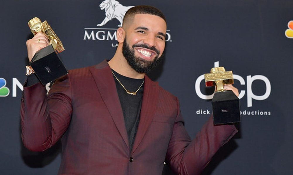 Drake Treats Fans to Shots in Tropical Paradise and Breaks Spotify Record