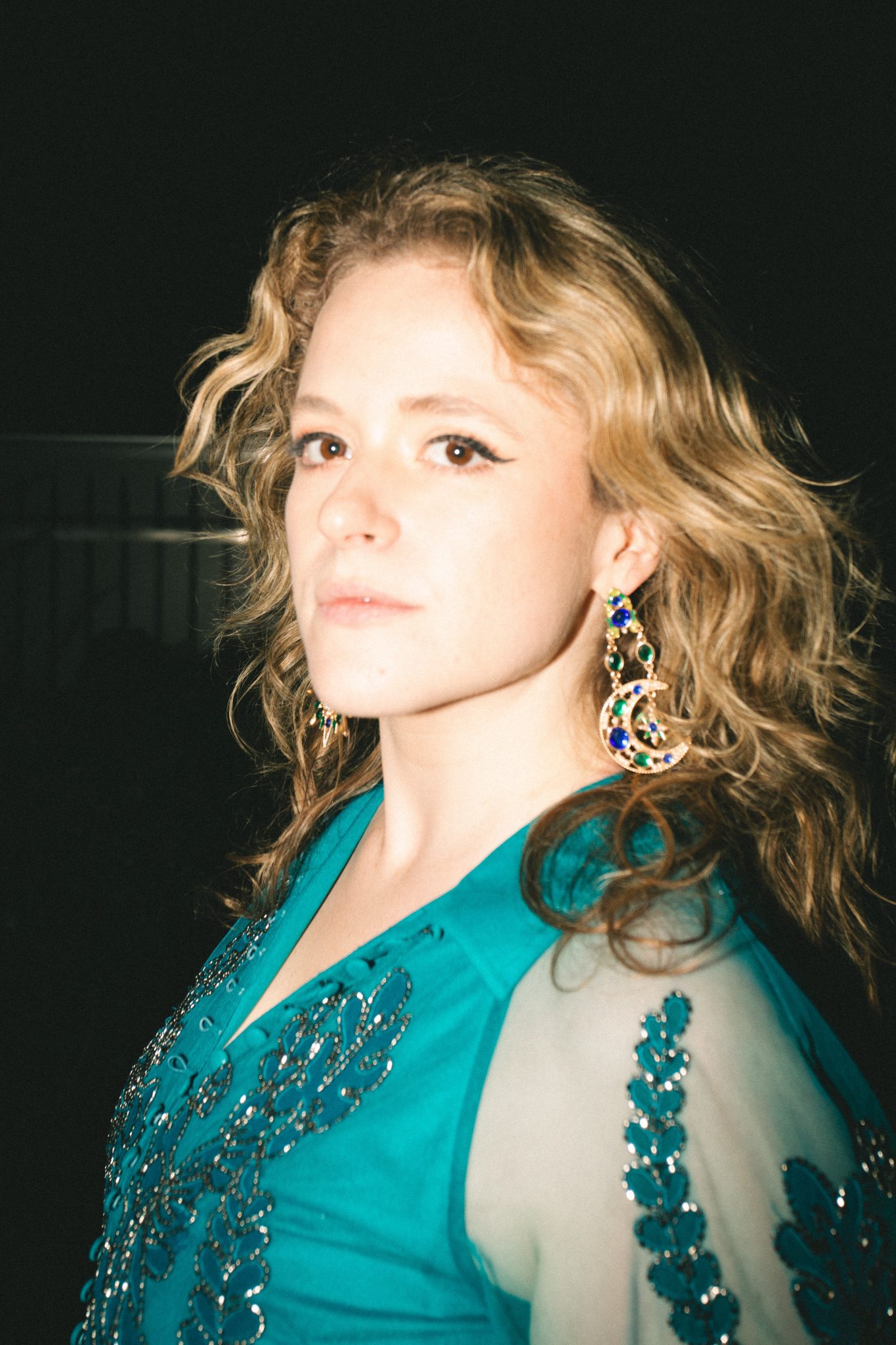 "Lonely Satellite" by Lexi Berg shares a serenade for the solitary heart